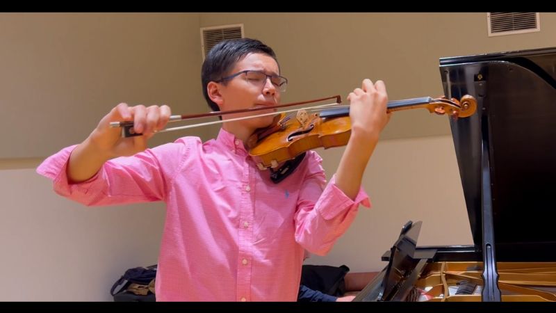 Dynamic Young Violinist - Daily Joy